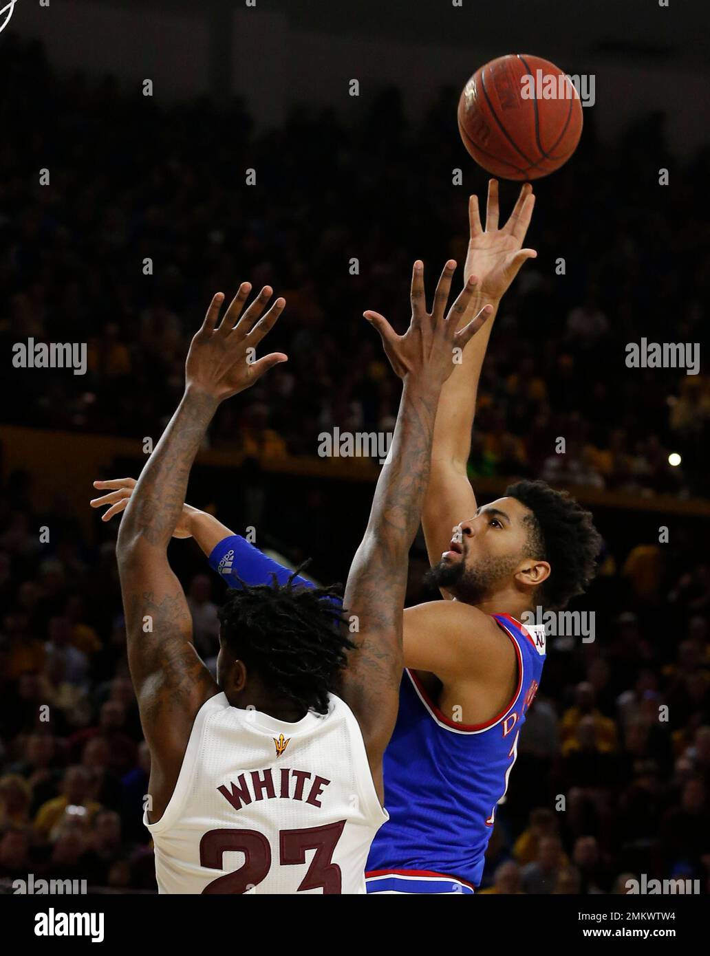 Kansas guard Devon Dotson shoots over Arizona State forward Romello ...