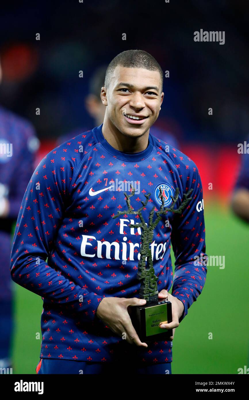 Paris St Germain's Kylian Mbappe poses and celebrates with the Kopa ...