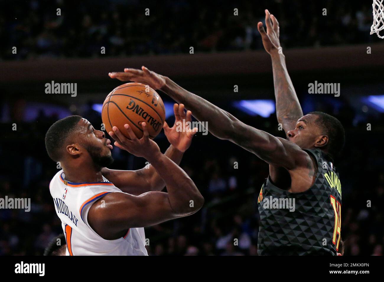 New York Knicks guard Emmanuel Mudiay has his shot blocked by Atlanta ...