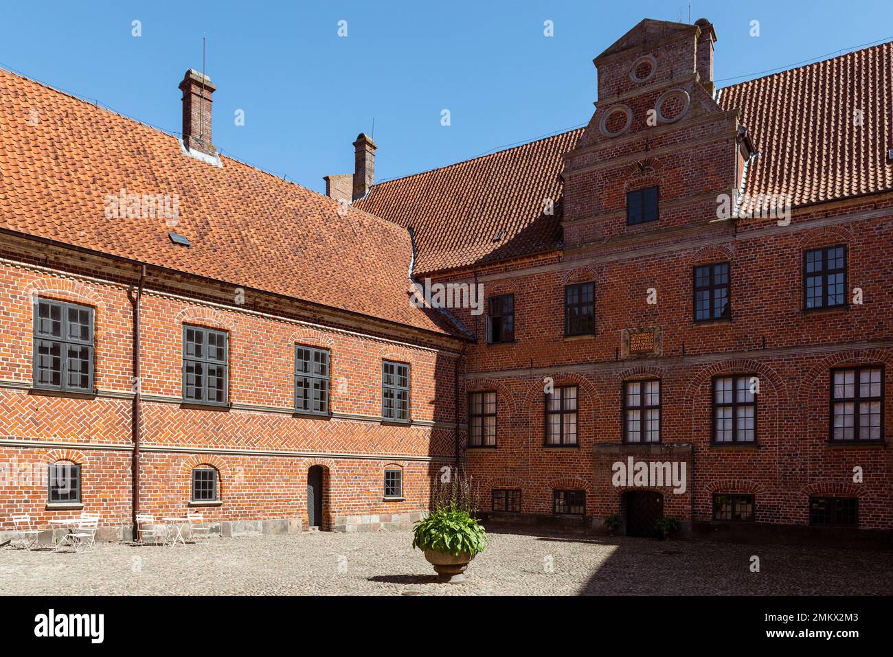 Red Renaissance brick façade in the courtyard of Rosenholm Castle ...