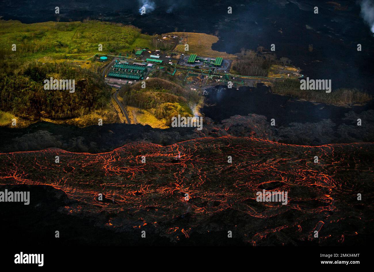 Lava from the Kilauea volcano flows near the Puna Geothermal Venture ...