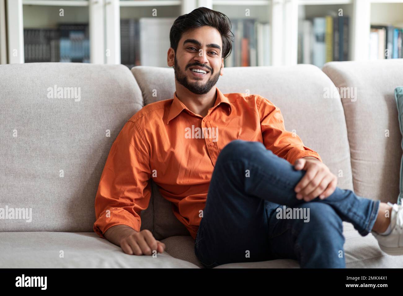 Handsome guy looking relaxed enjoying hi-res stock photography and ...