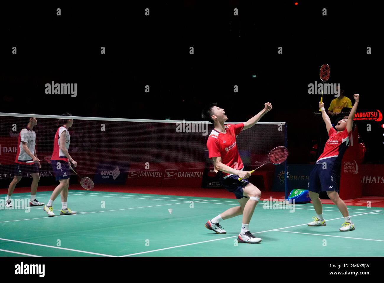 China's Feng Yan Zhe, second right, and Huang Dong Ping celebrate after ...