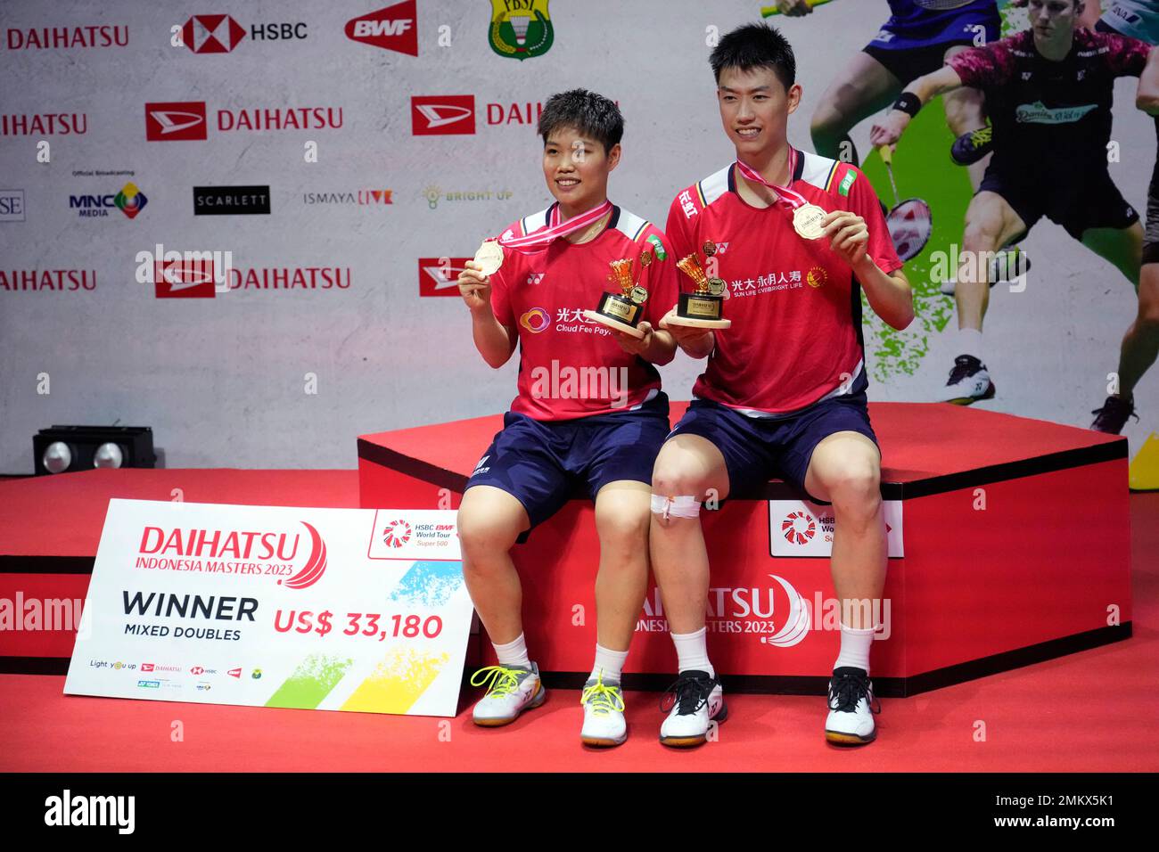 China's Feng Yan Zhe, right, and Huang Dong Ping pose for a photo as ...