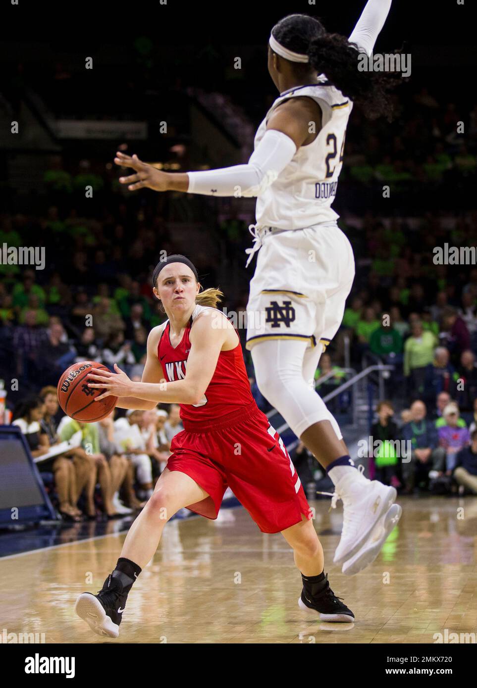 Western Kentucky's Whitney Creech (5) pump fakes in front of Notre Dame ...