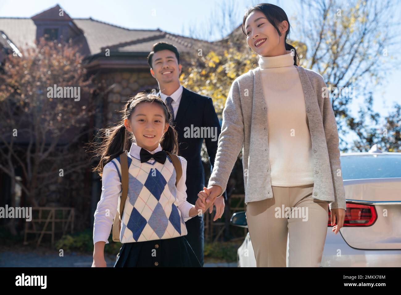 Chinese parents pick up their children from school hi-res stock ...