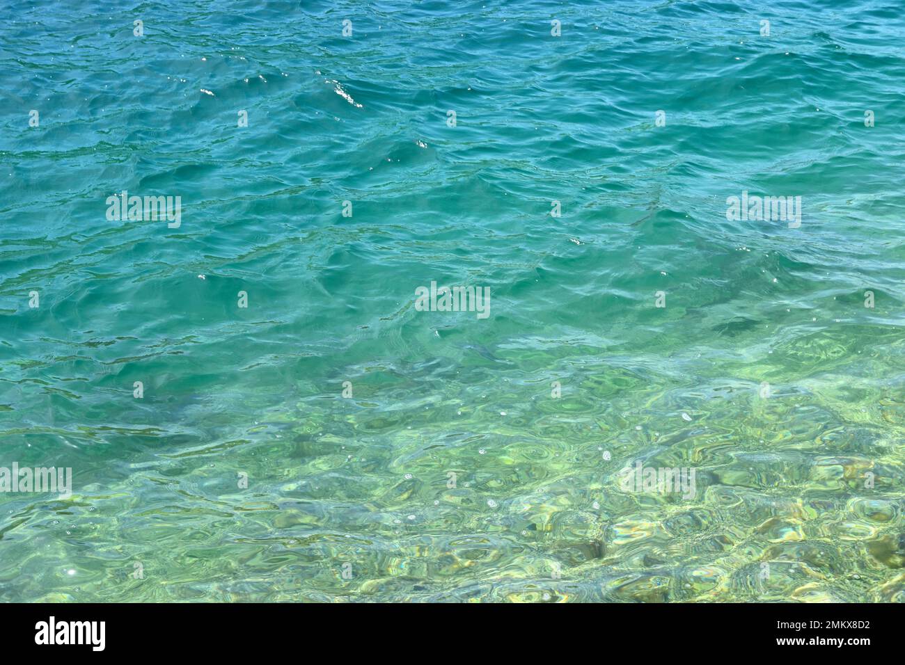 Surface of the sea. Natural texture of sea water. Turquoise ocean water ...
