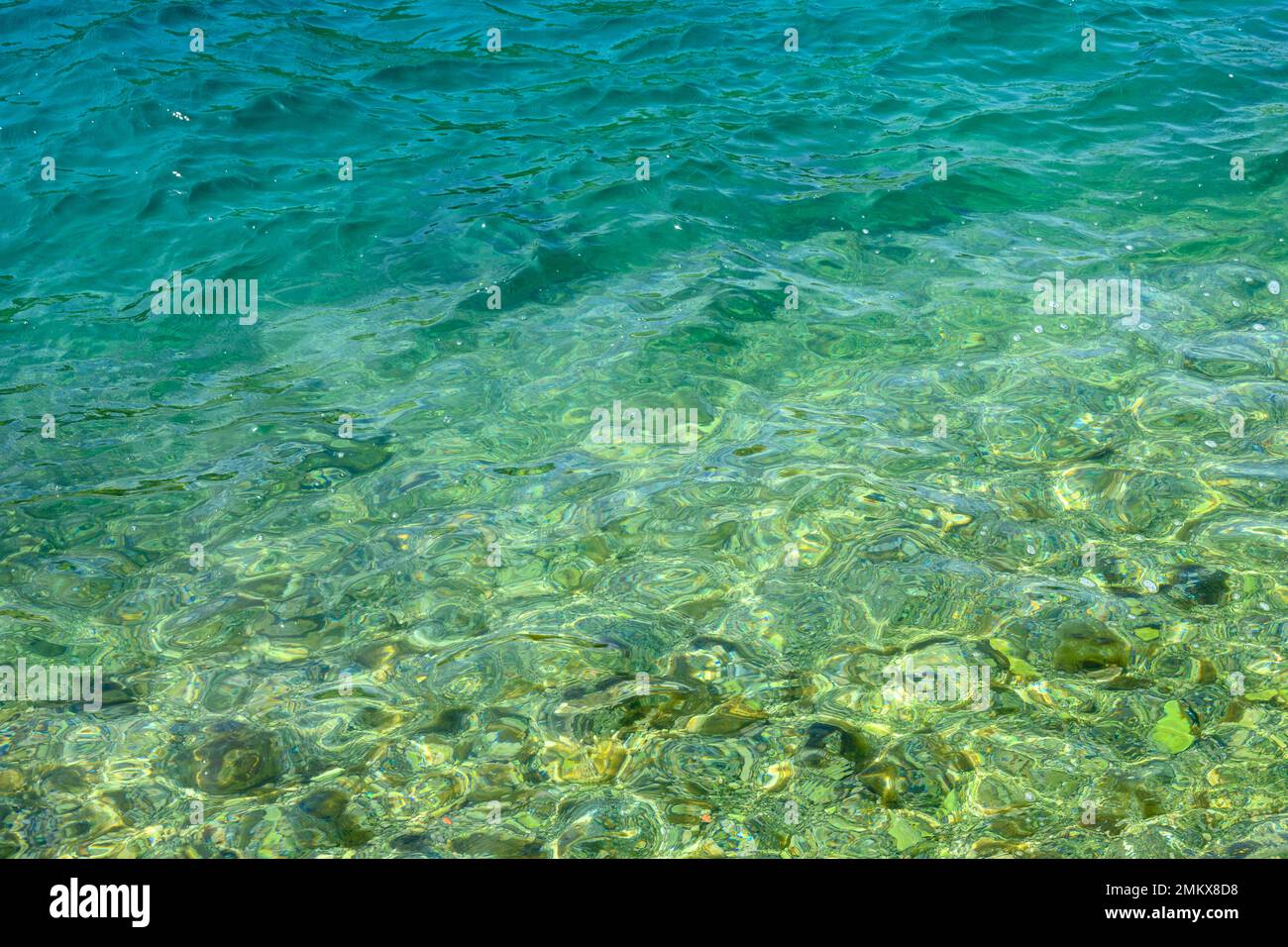Surface of the sea. Natural texture of sea water. Emerald ocean water ...