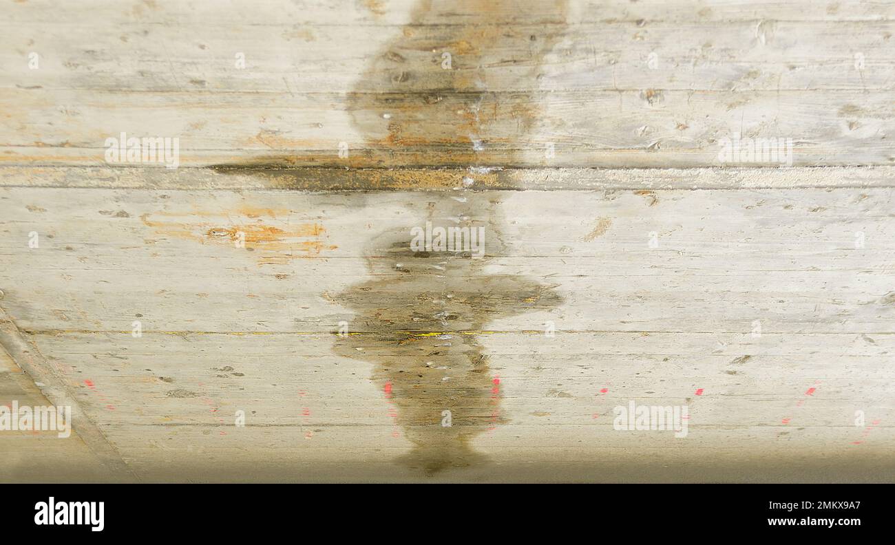 Rain water leaks on the roof causing damage Stock Photo - Alamy