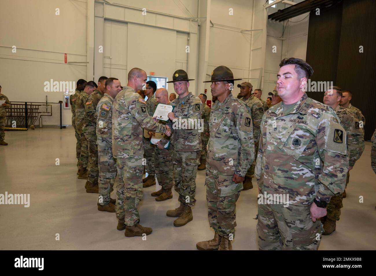U.S. Army Col. Jake Miller, and Command Sgt. Maj. Michael Resmondo ...