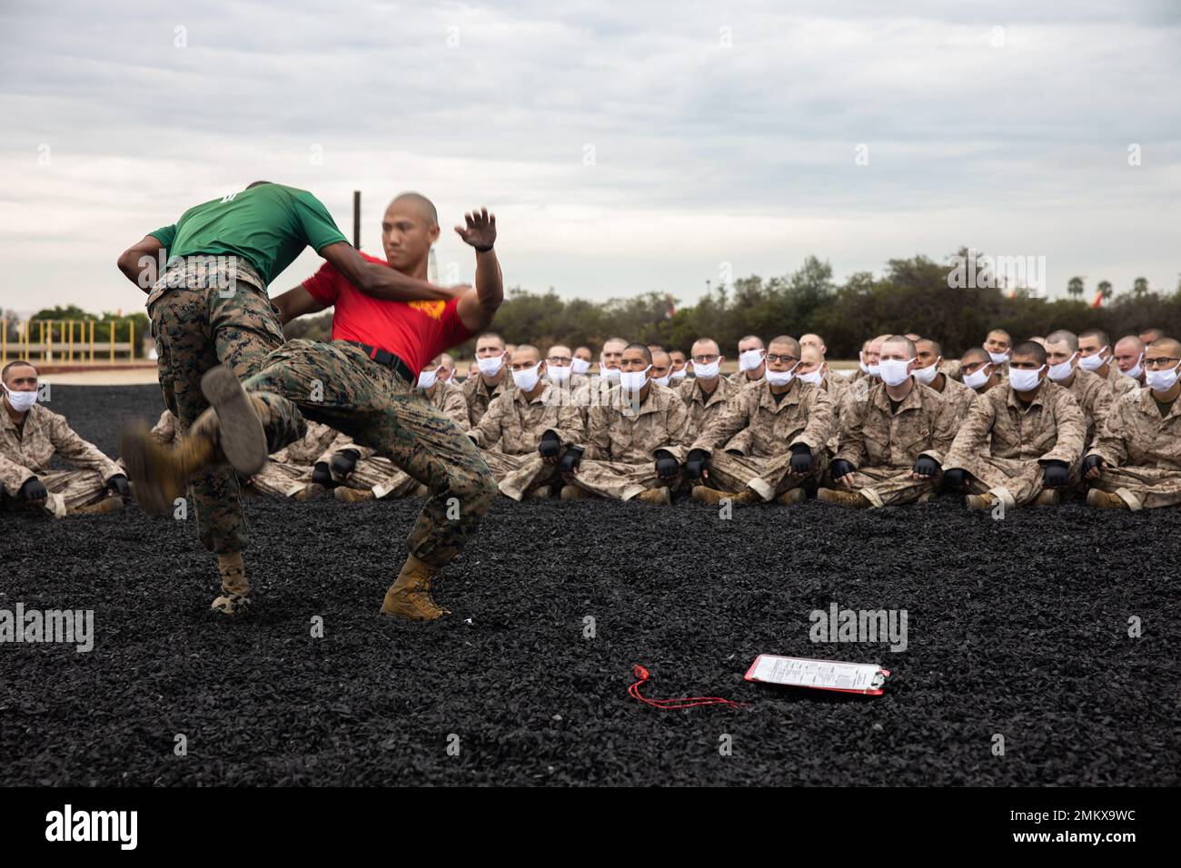 U.S. Marine Corps Sgt. Thomas McKnight (left), a drill instructor with ...