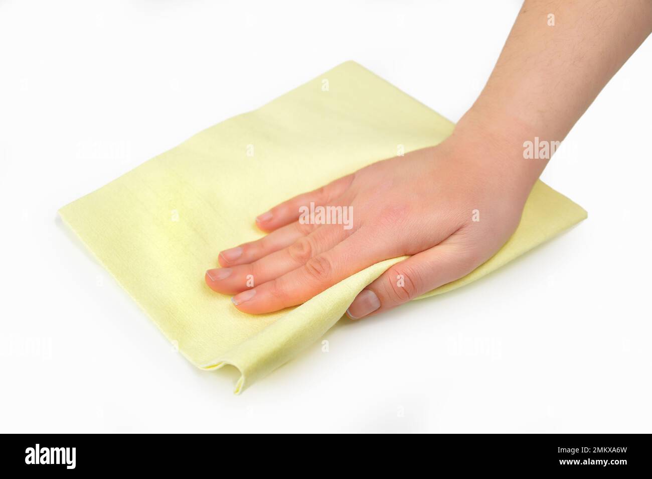 Hand wiping surface with yellow rag isolated on white Stock Photo - Alamy