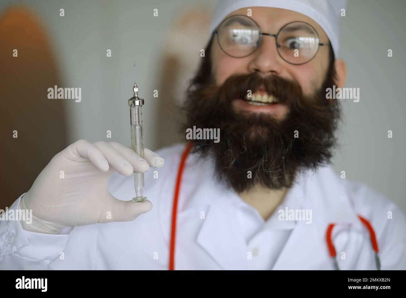 Doctor crazy. Mad beard scientist conducts experiments in a scientific ...