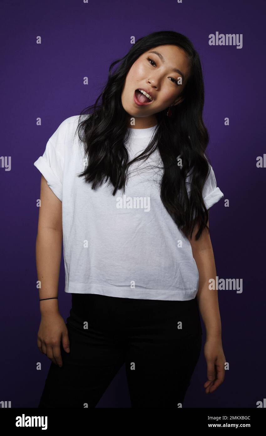 In this Dec. 5, 2018 photo, actress-rapper Awkwafina poses for a ...