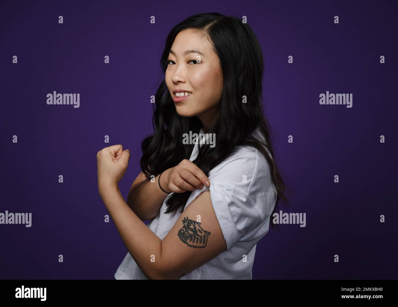 In this Dec. 5, 2018 photo, actress-rapper Awkwafina poses for a ...