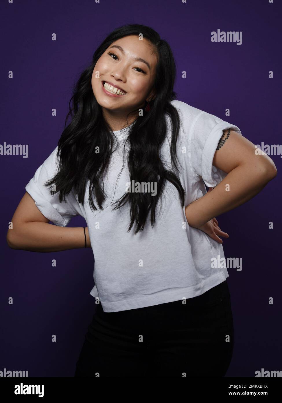 In this Dec. 5, 2018 photo, actress-rapper Awkwafina poses for a ...