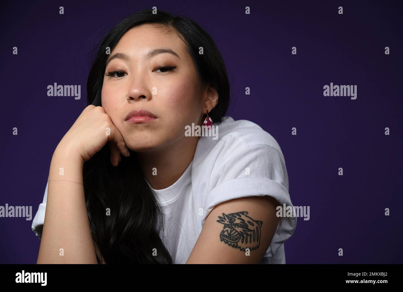 In this Dec. 5, 2018 photo, actress-rapper Awkwafina poses for a ...