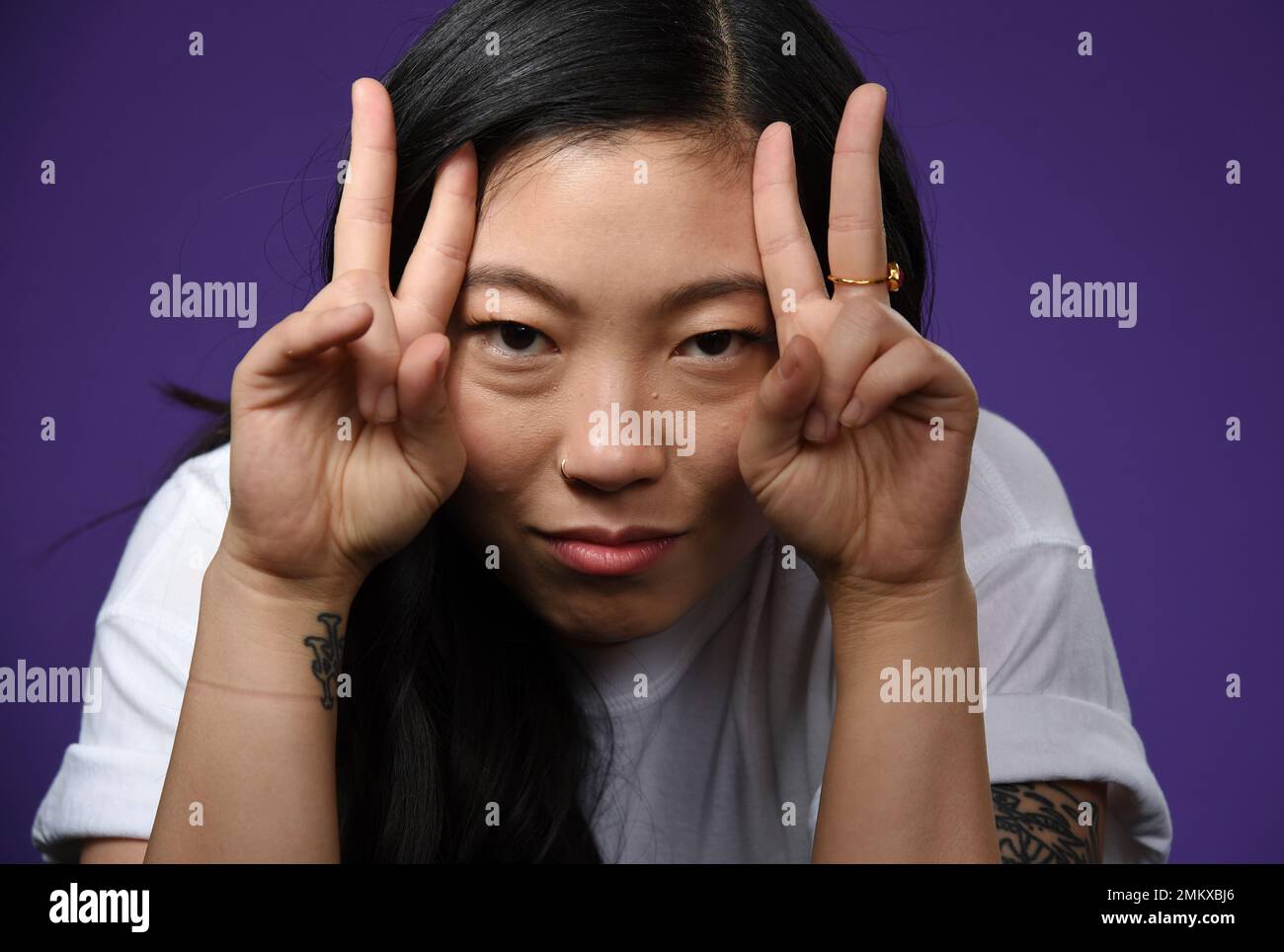 In this Dec. 5, 2018 photo, actress-rapper Awkwafina poses for a ...