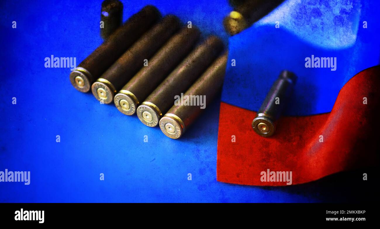 Russian flag and bullet casings on table. Background concept Russian ...