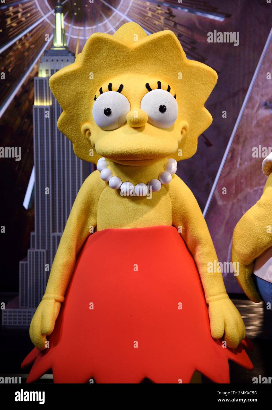Costumed character Lisa Simpson participates in Fox's "The Simpsons ...