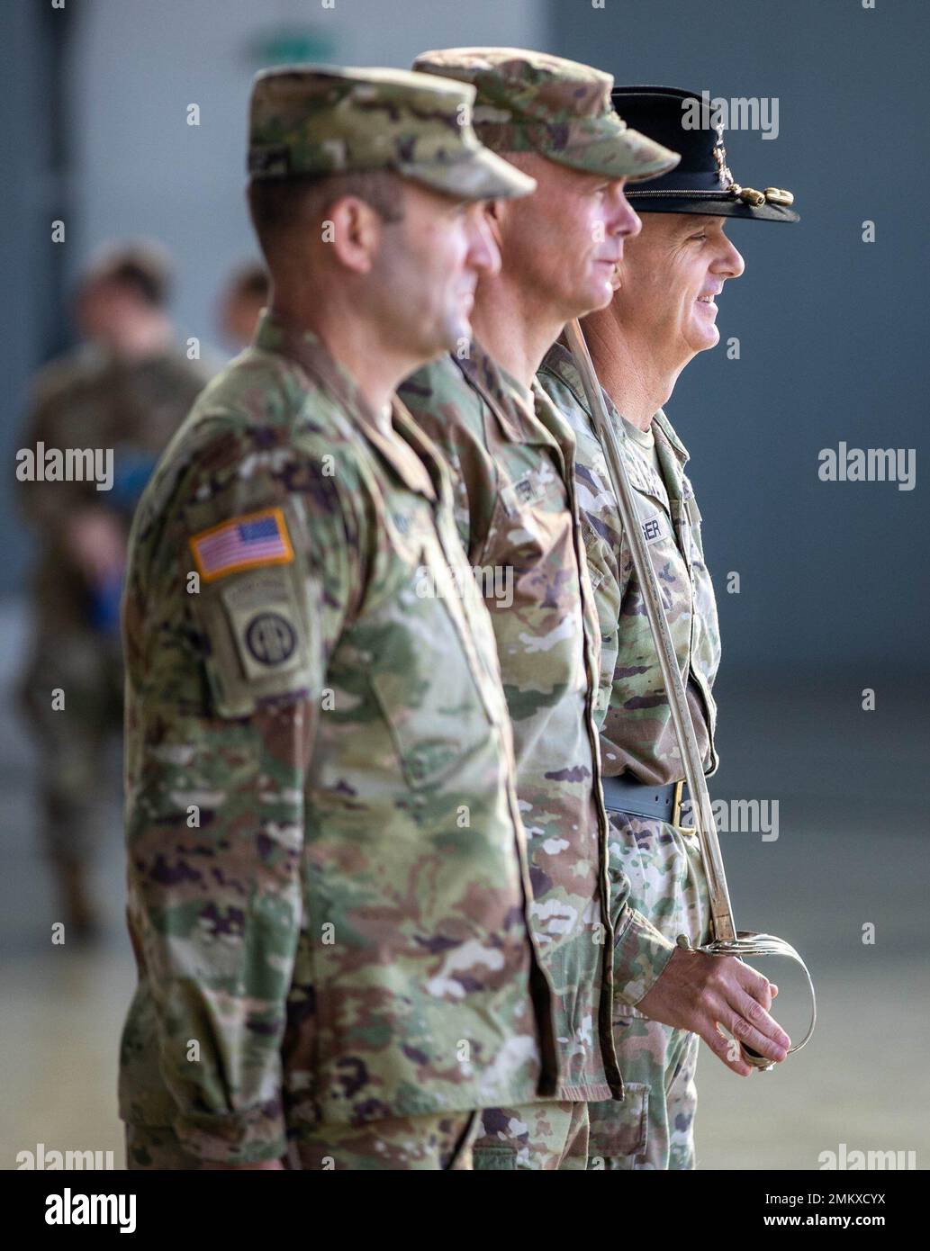 Col. Morris, Maj. Gen. Meyer, and Col. Jaeger (left to right) stand ...