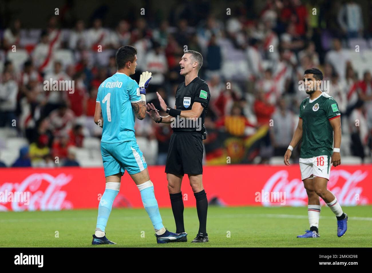 Mexico's Guadalajara goalkeeper Raul Gudino speaks with referee Matt ...