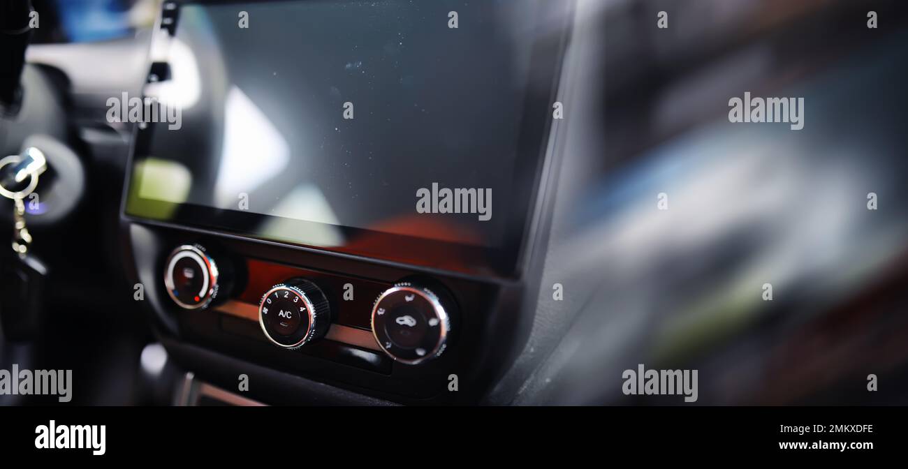 The process of choosing climate control in the car. Man regulating ...