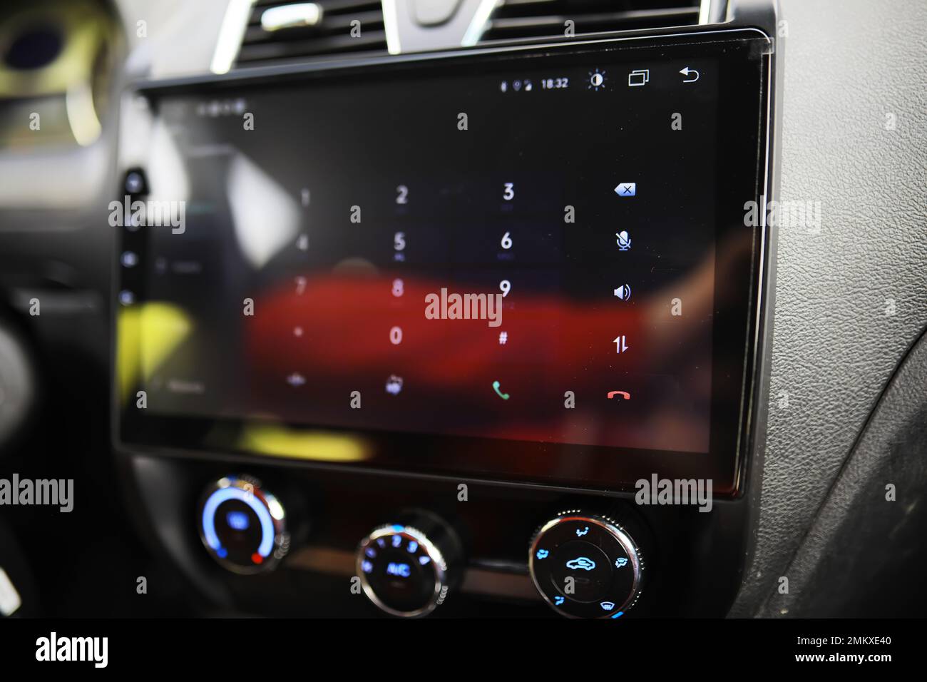 The process of choosing climate control in the car. Man regulating ...