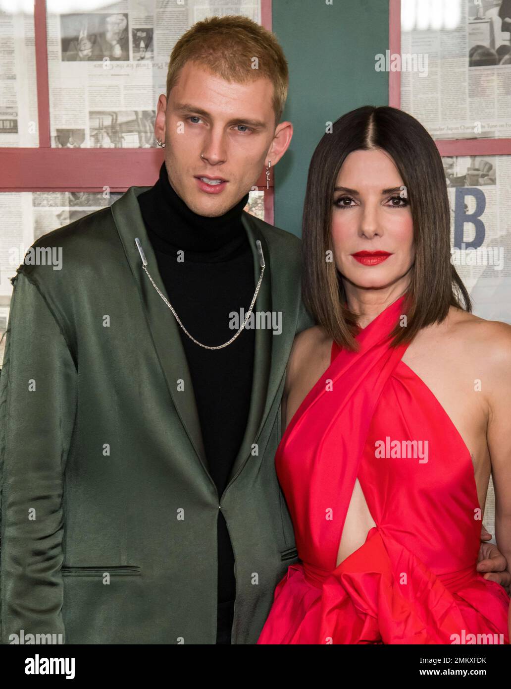 Colson Baker and Sandra Bullock attend a screening of "Bird Box" at ...