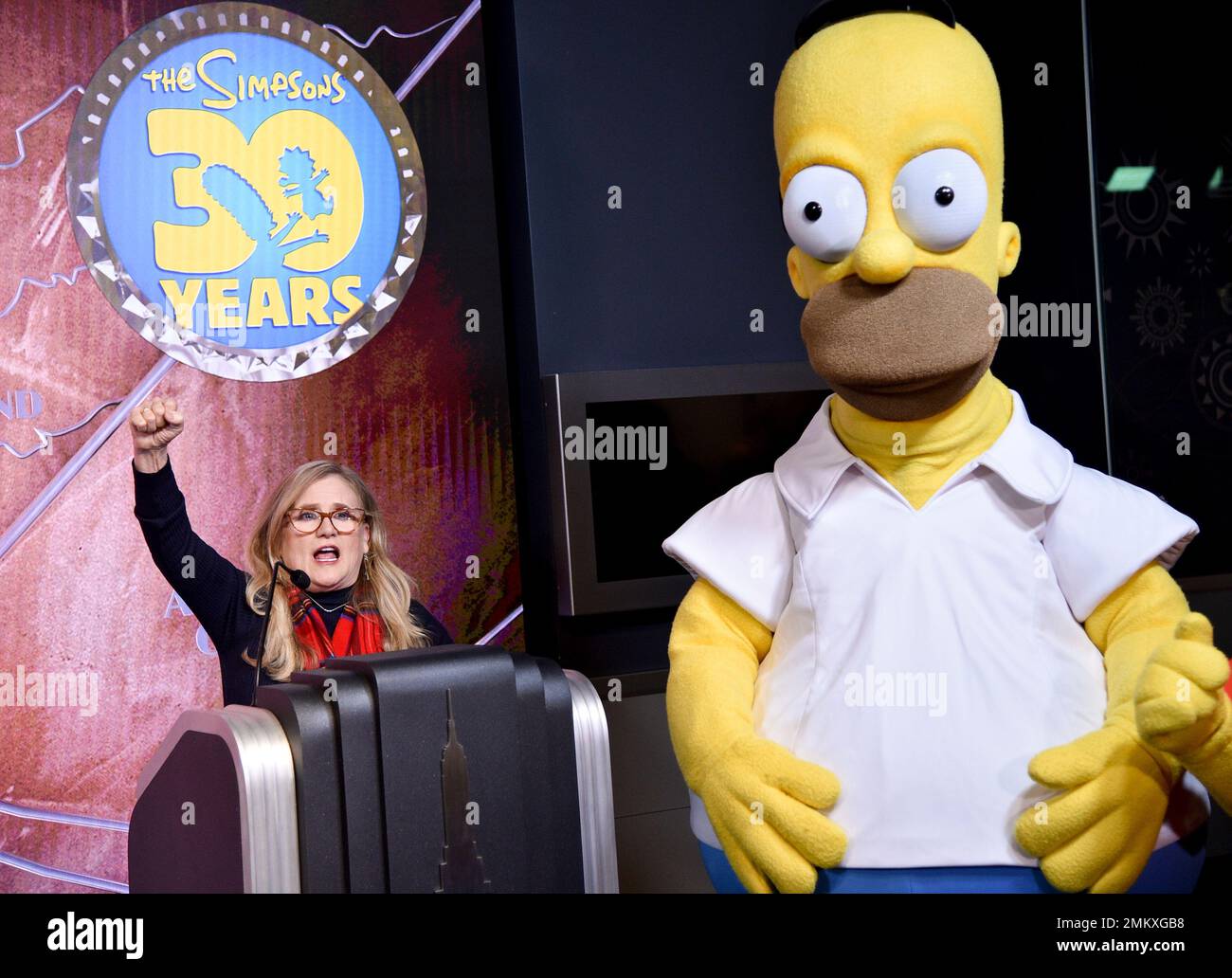 Nancy Cartwright, who voices the character Bart Simpson, left, appears ...