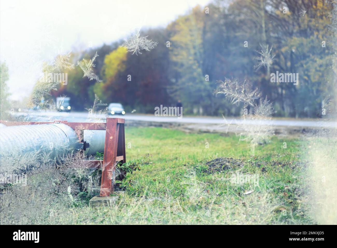 Metal pipes on the street. pipes from the pipeline. gas pipeline for ...