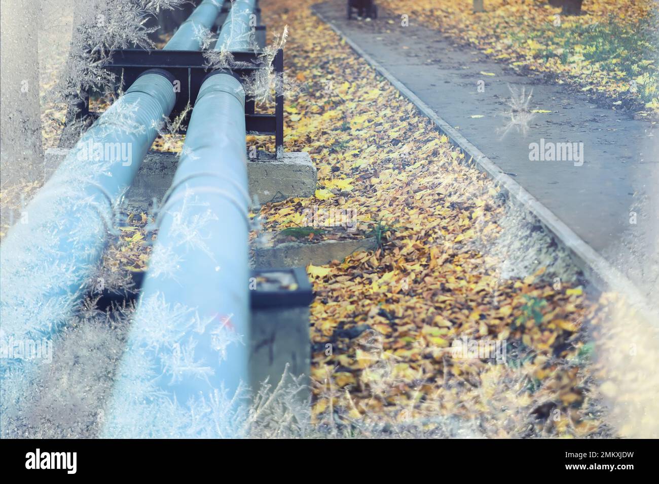 Metal pipes on the street. pipes from the pipeline. gas pipeline for ...