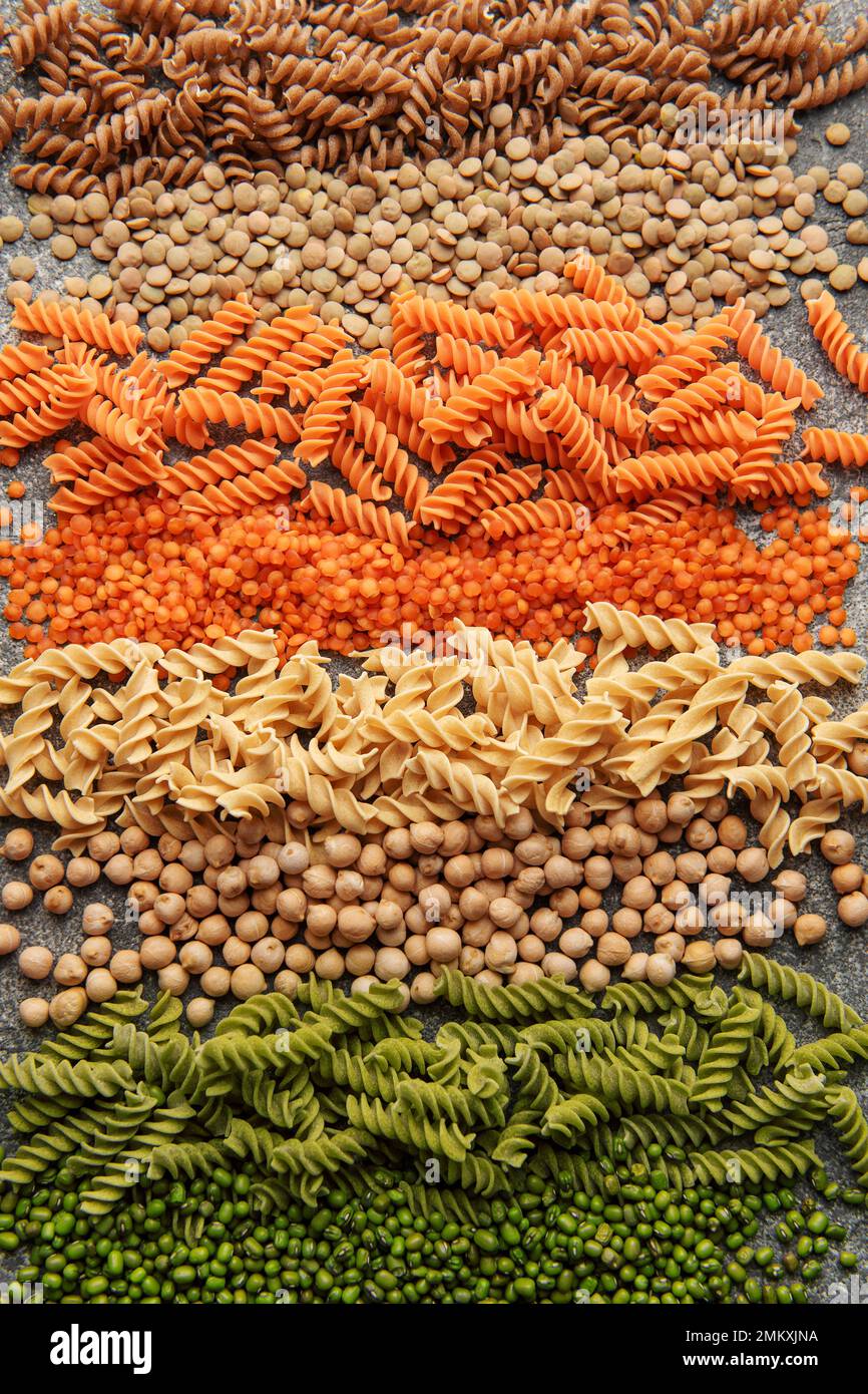 A variety of fusilli pasta made from different types of legumes, green ...