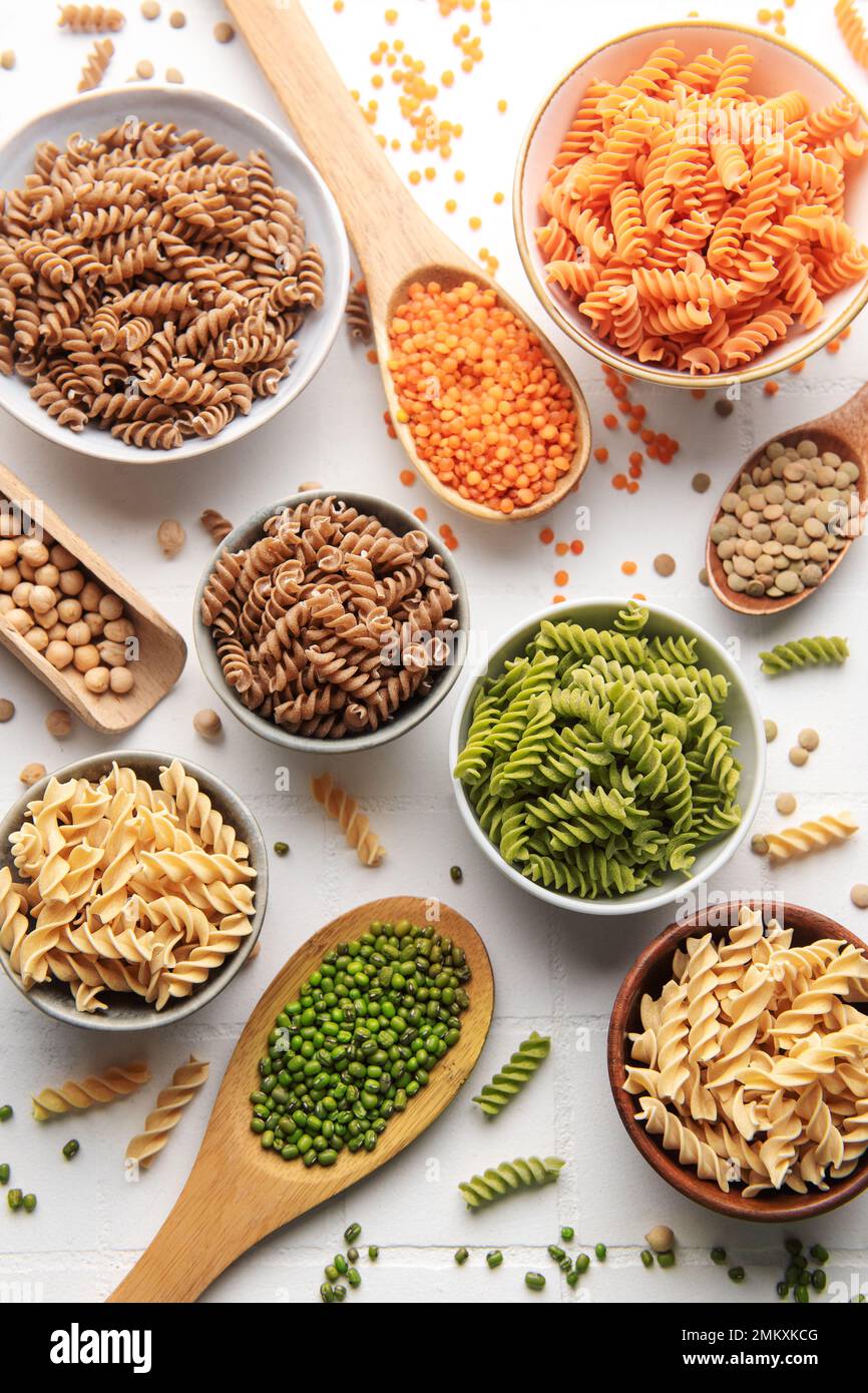 A variety of fusilli pasta made from different types of legumes, green ...