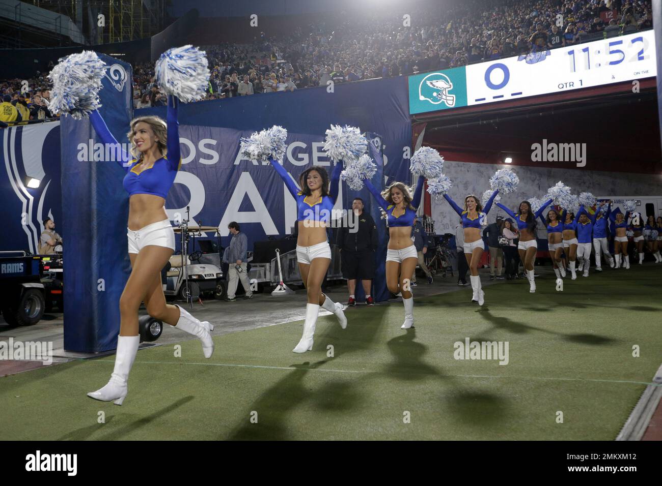 Los Angeles Rams cheerleaders take the field before an NFL football ...