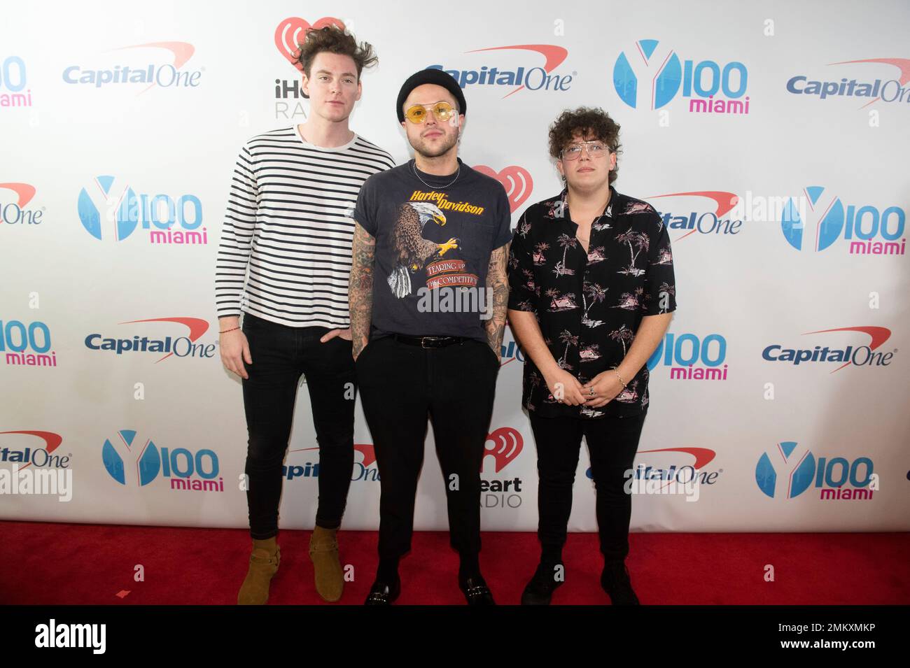 Jordan Greenwald, from left, Mitchy Collins and Sam Price of Lovelytheband pose at Y100's Jingle ...