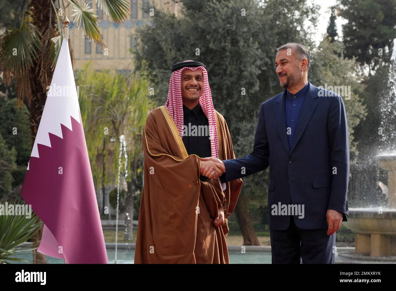 Qatari Foreign Minister Sheikh Mohammed bin Abdulrahman Al Thani, left ...