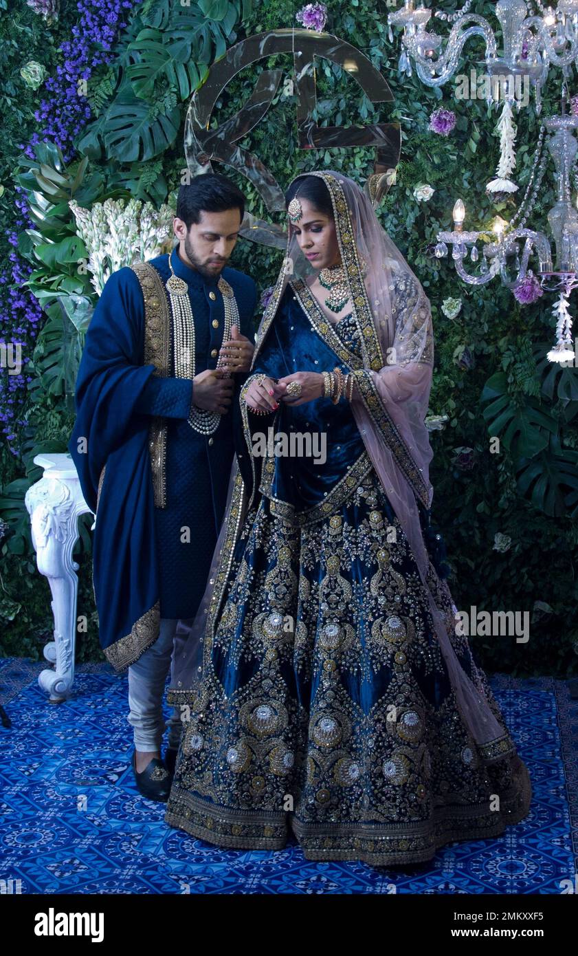 Indian badminton players Saina Nehwal, right and Parupalli Kashyap pose ...