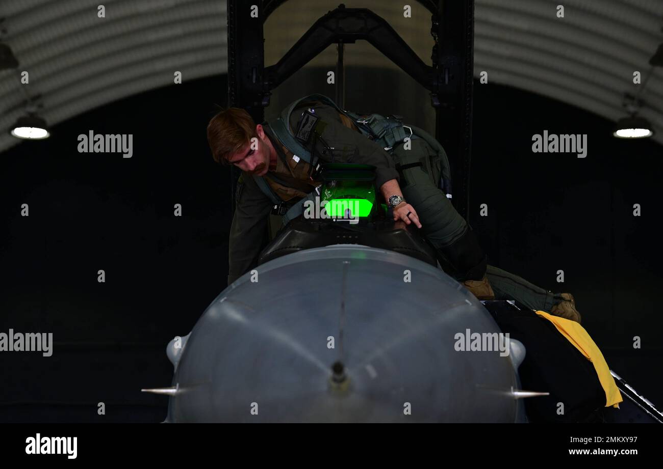 U.S. Air Force 1st Lt. Seth Padget, 80th Fighter Squadron pilot, climbs ...
