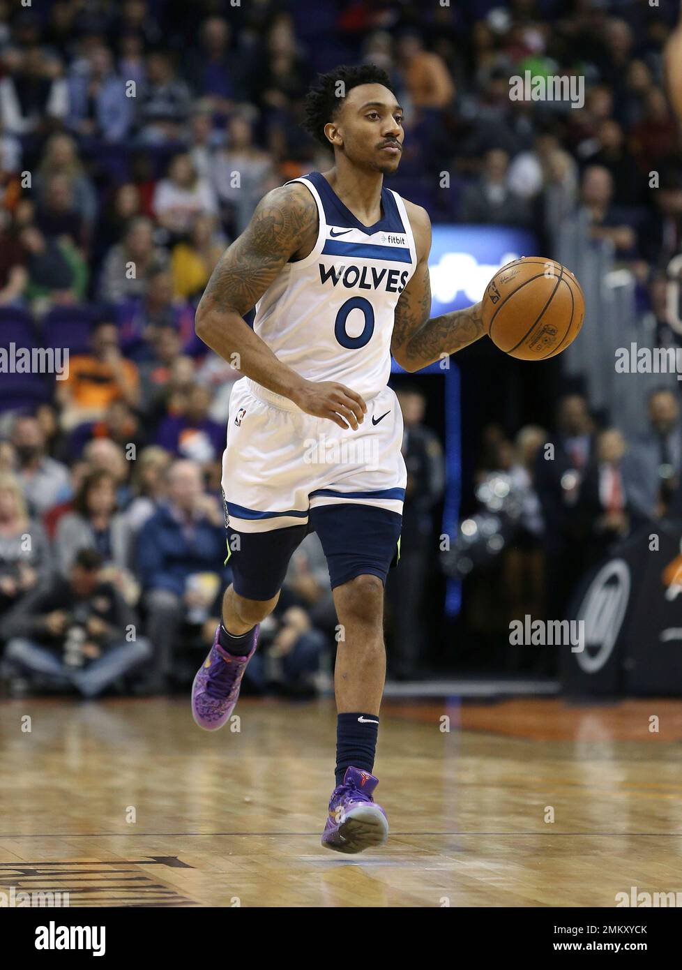 Minnesota Timberwolves guard Jeff Teague advances the ball up court ...
