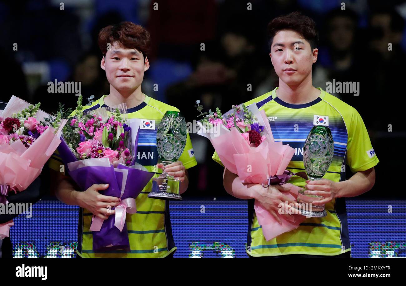 South Korea's Jang Woo-jin, left, and Lim Jong-hoon pose with their ...