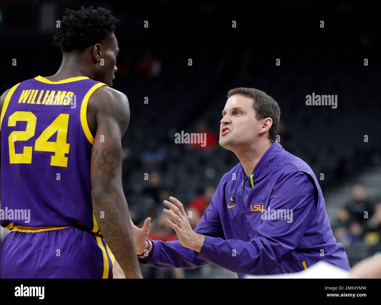 LSU head coach Will Wade, right, talks with Emmitt Williams during the ...