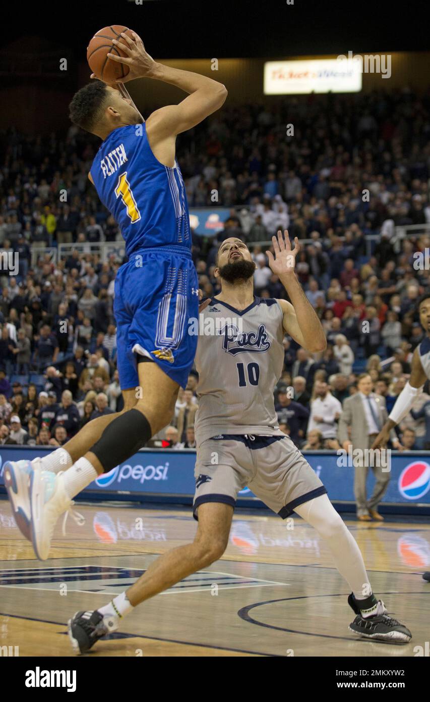 South Dakota State guard Skyler Flatten (1) shoots over Nevada's Caleb ...