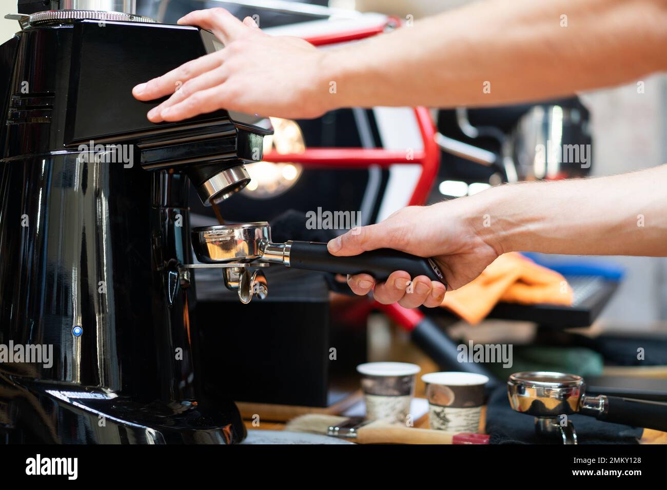 barista makes coffee in a coffee machine Stock Photo - Alamy