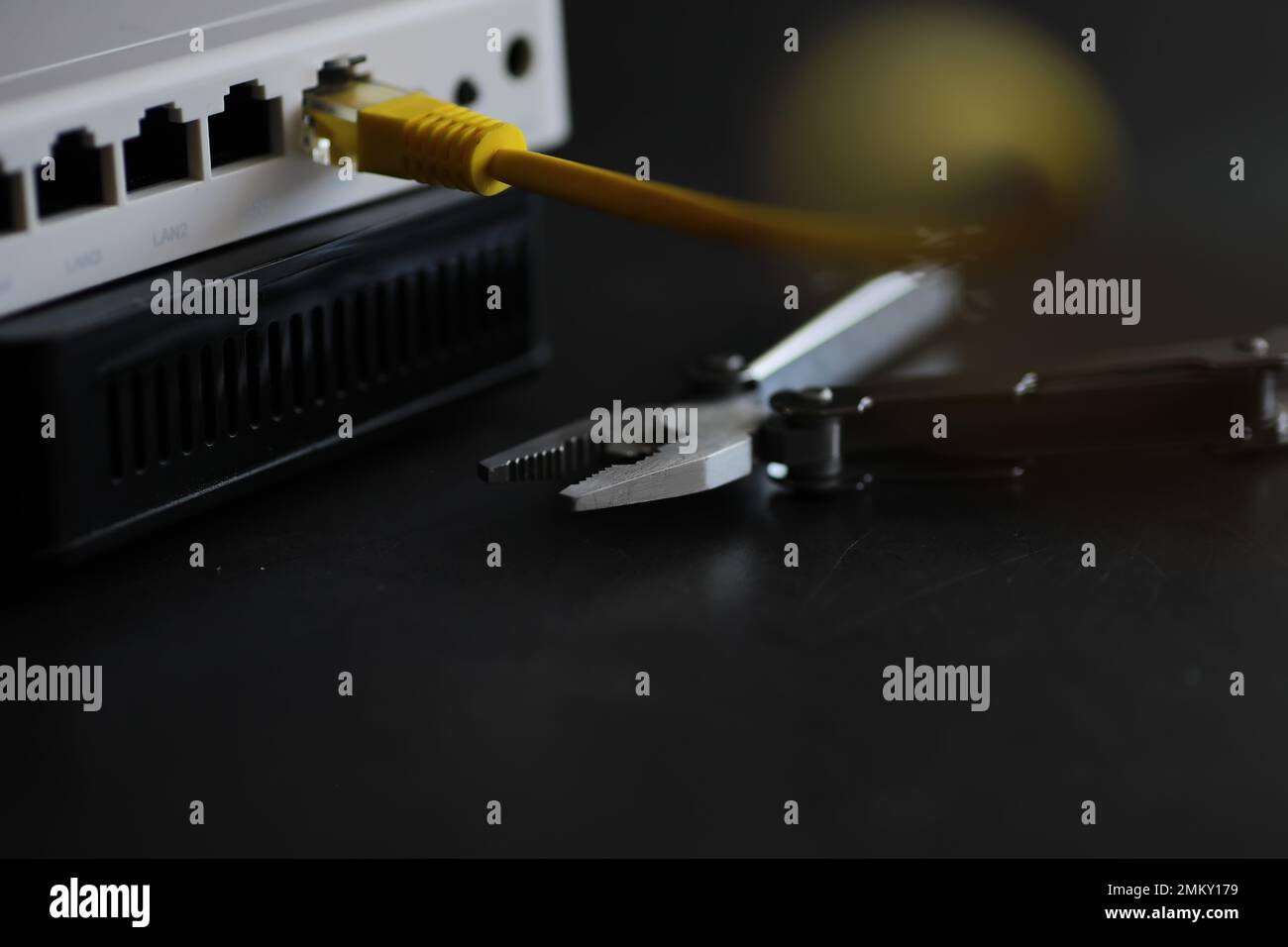 Modern dual band wireless router. Man working in the background. Fast ...