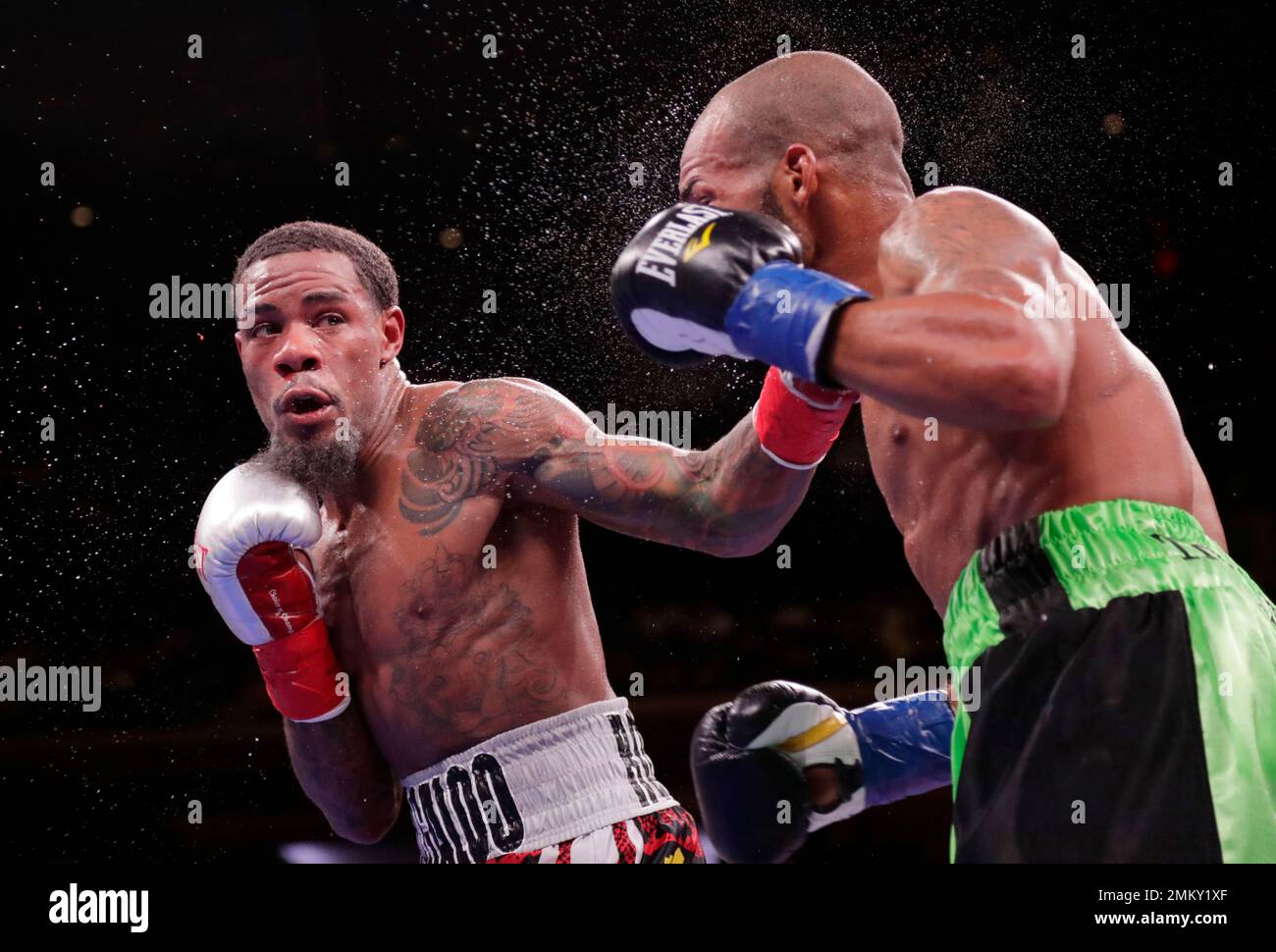 Lamont Roach Jr., left, punches Puerto Rico's Albert Mercado during the ...