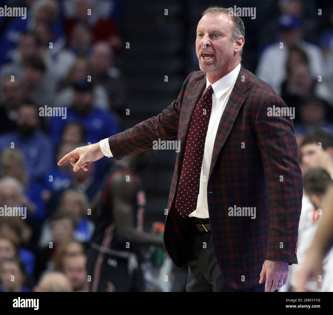 Utah head coach Larry Krystkowiak directs his team during the second ...