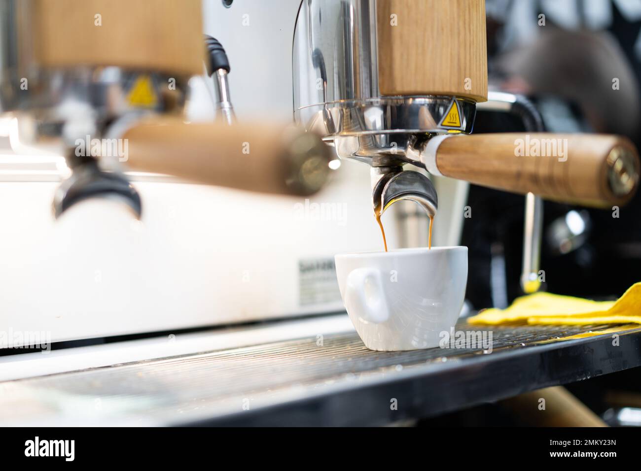 Barista makes coffee professional machine hi-res stock photography and ...