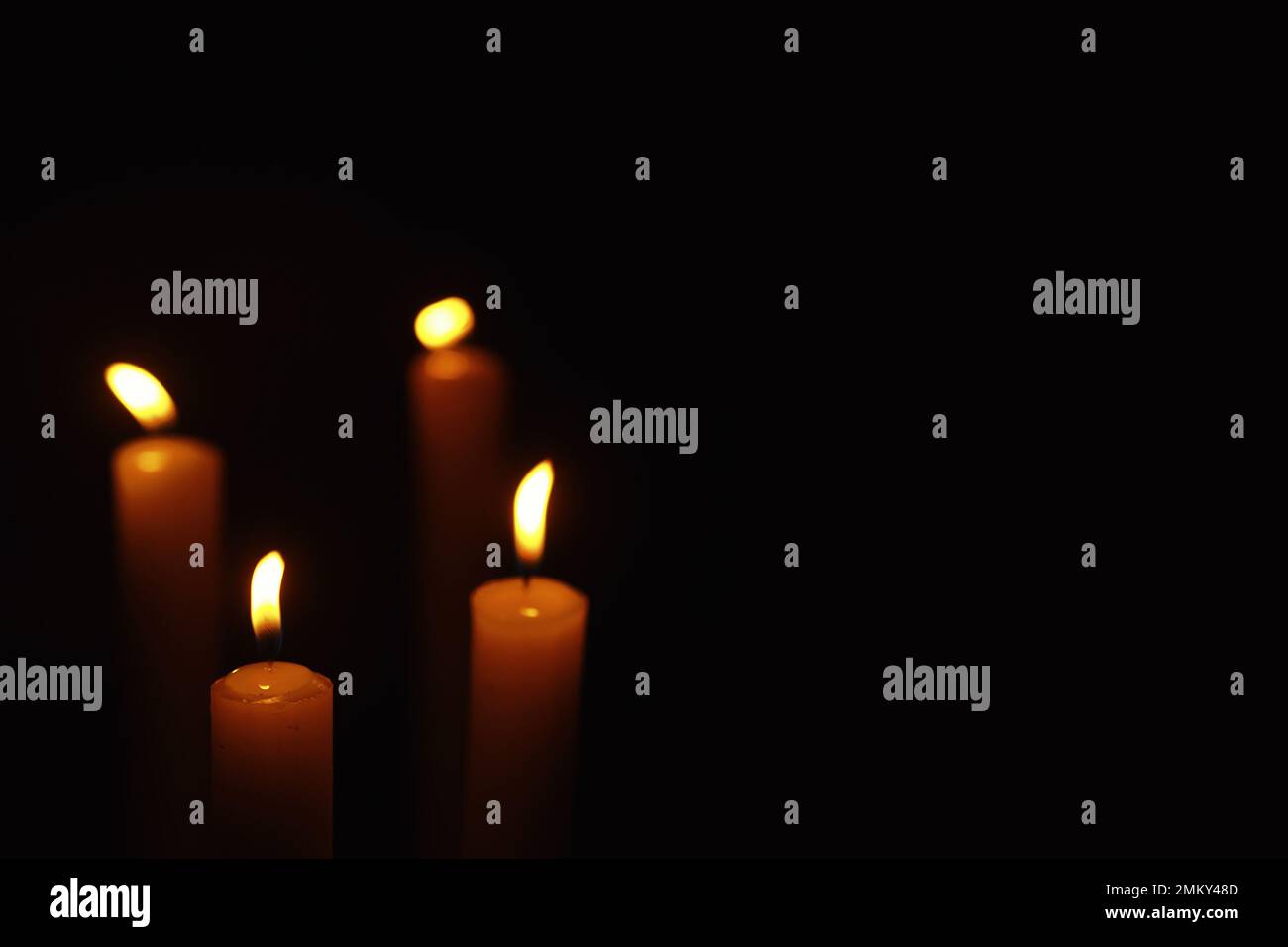 Burning candle Wick from a candle in flame of fire. Symbol of sadness ...