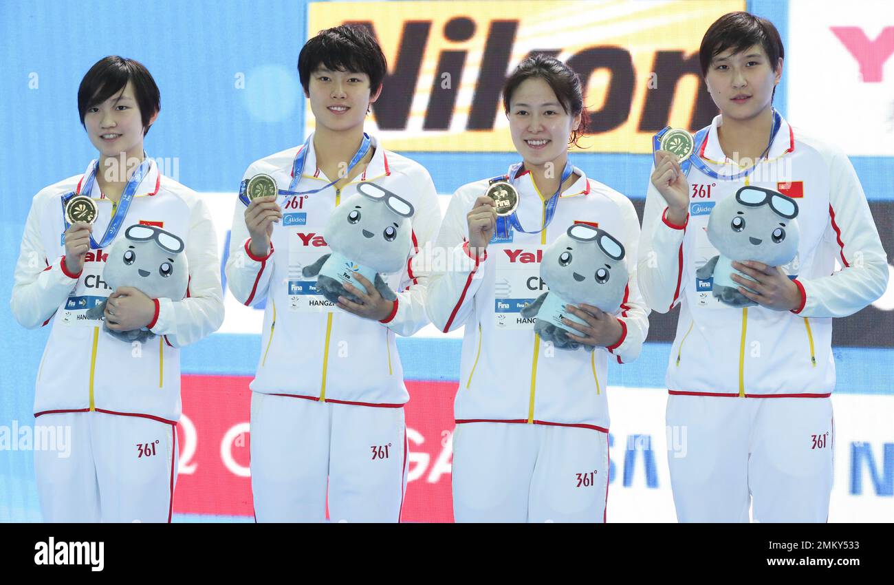 Gold medalists China's, from left, Bingie Li, Junxuan Yang, Yuhan Zhang ...